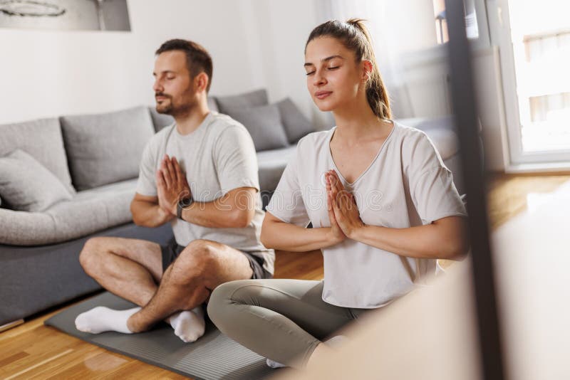 Couple Meditating Together at Home Stock Image - Image of caucasian ...