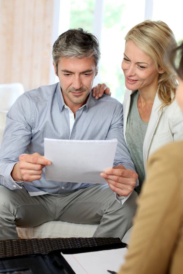 Indian Couple Meeting with Financial Advisor at Home Stock Photo ...