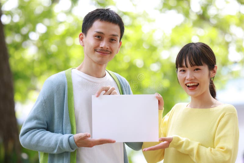 Couple with message board stock photo. Image of japanese - 238935644