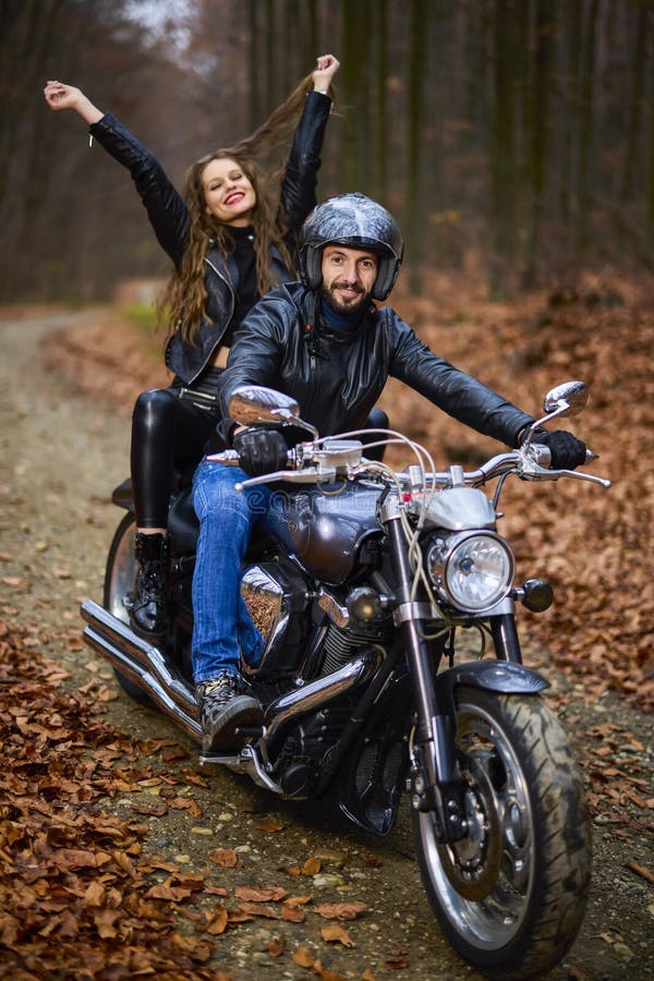 Couple of Motorcyclists with a Chopper. Stock Photo - Image of autumn ...