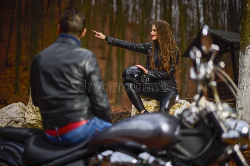 Couple of Motorcyclists with a Chopper. Stock Photo - Image of ride ...