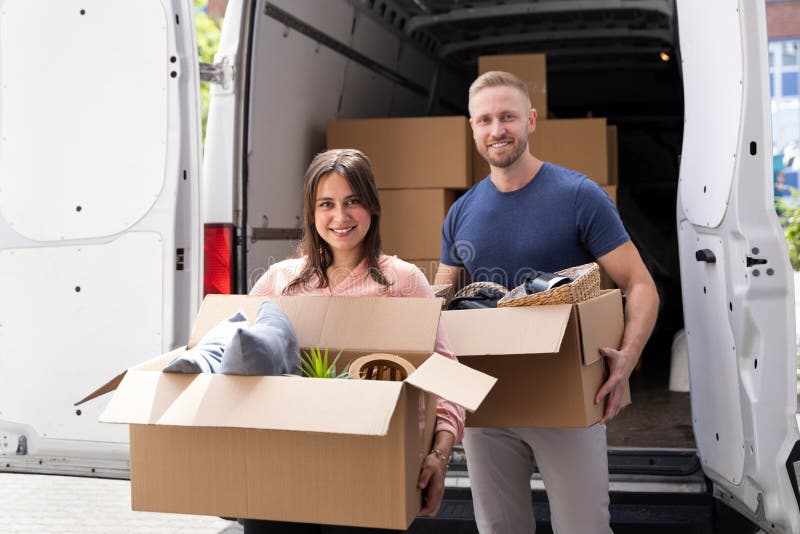 Couple Moving Boxes from Van or Truck Stock Photo - Image of horizontal ...