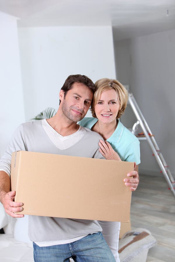 Couple on moving day stock image. Image of excitement - 24160089