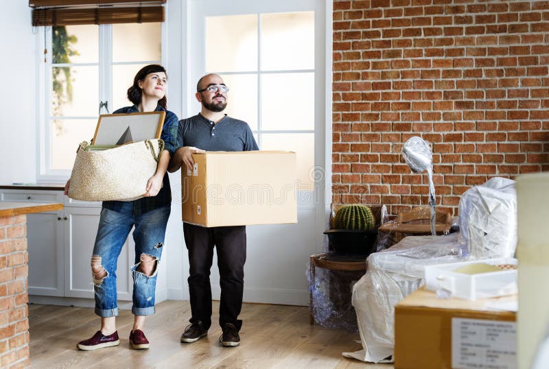 Couple Moving into New House Stock Photo - Image of american, european ...