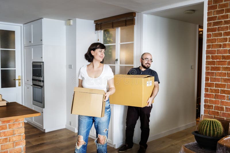Couple Moving into New House Stock Image - Image of girlfriend, moving ...