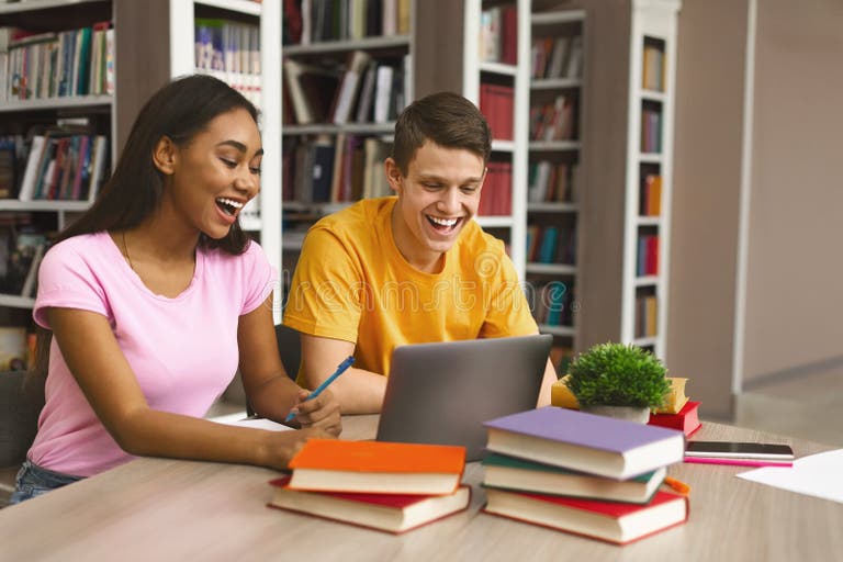 Couple of Multinational Students Working with Science Project in ...