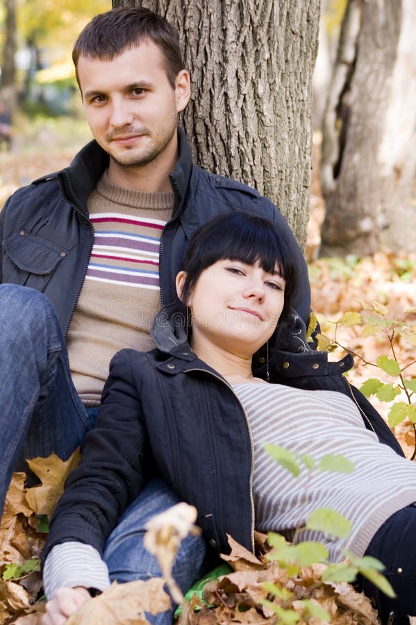 Couple near the tree stock image. Image of casual, outdoors - 3340181