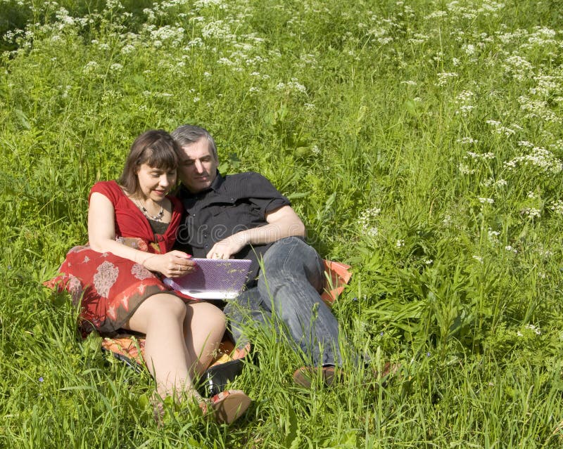 Couple with notebook stock photo. Image of adult, young - 17069678