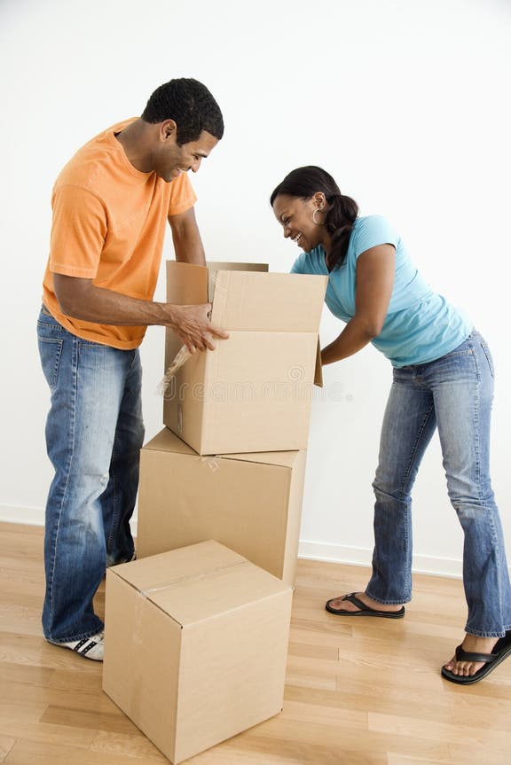 Couple packing boxes stock image. Image of happy, lifestyle - 6152093
