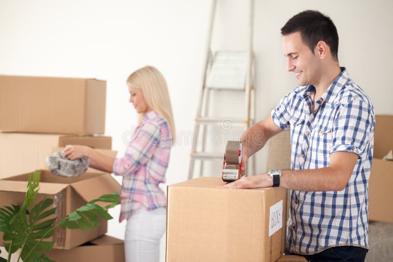 Couple Packing Moving Boxes Stock Photo - Image of cardboard, home ...