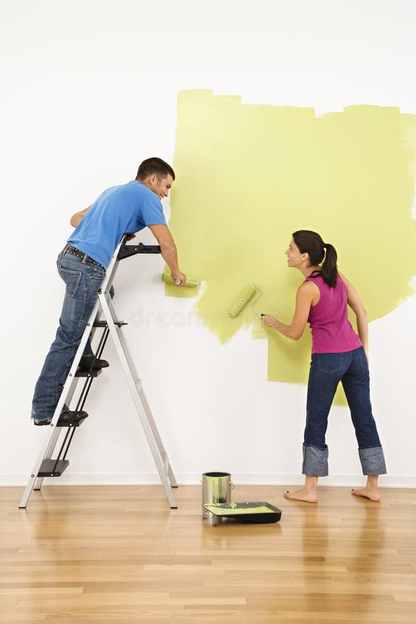 Happy Family Redecorating the House - Painting Stock Photo - Image of ...