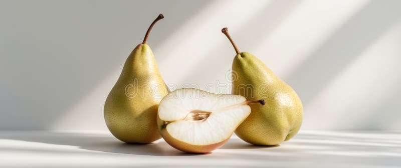 A Couple of Pears with a Slice Cut in Half Stock Photo - Image of rate ...