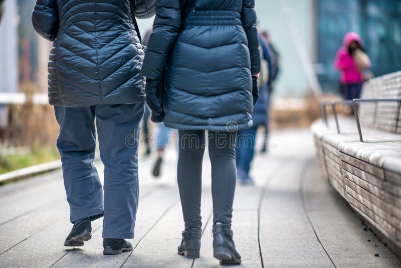 Couple of People Walking Along High Line in Manhattan, Back View from ...