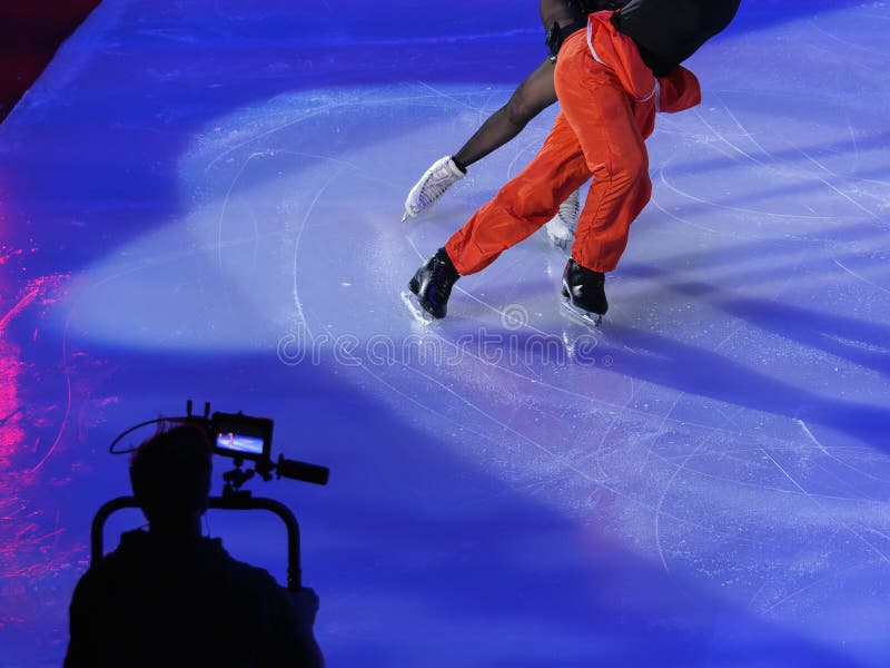 Couple Performing Artistic and Technical Performance on the Ice Rink ...