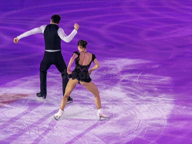 Couple Performing Artistic and Technical Performance on the Ice Rink ...