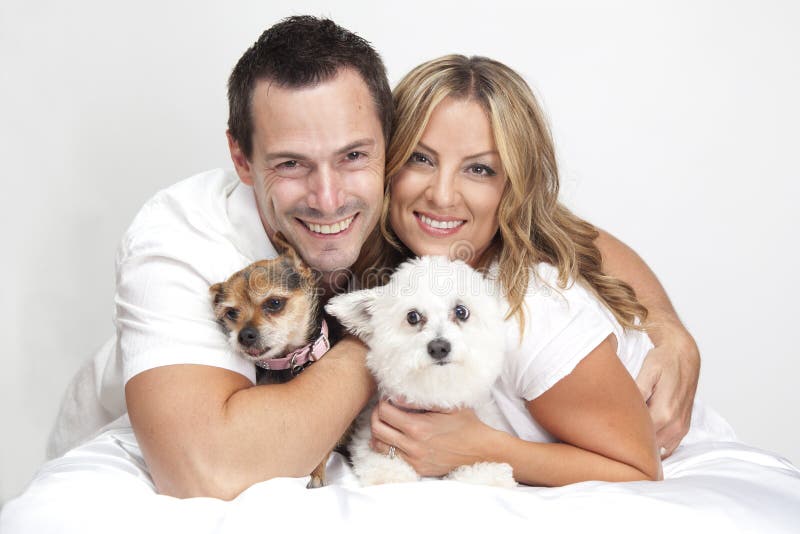 Couple with dogs stock photo. Image of couple, identity - 35338640