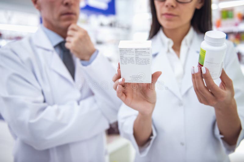 Couple of pharmacists stock image. Image of drugs, care - 293712265