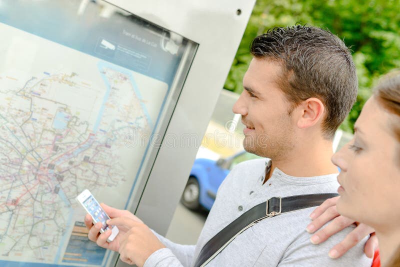 Couple Planning Their Route Stock Photo - Image of visiting, tourism ...