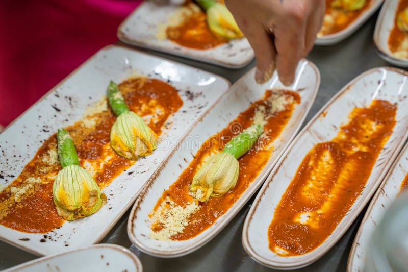 A Couple of Platters with Plates that are on a Table Stock Photo ...