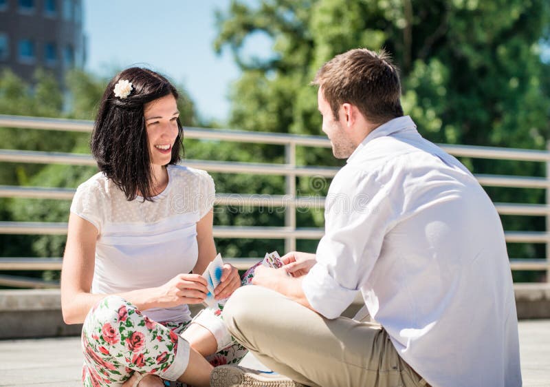 Couple playing cards stock image. Image of sunny, friendship - 71547577