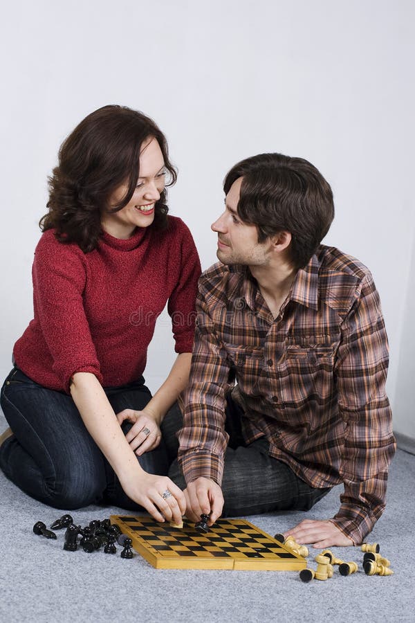 Couple playing chess stock image. Image of male, living - 11778309