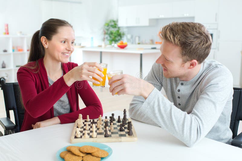 Couple playing chess stock photo. Image of looking, caucasian - 258549432
