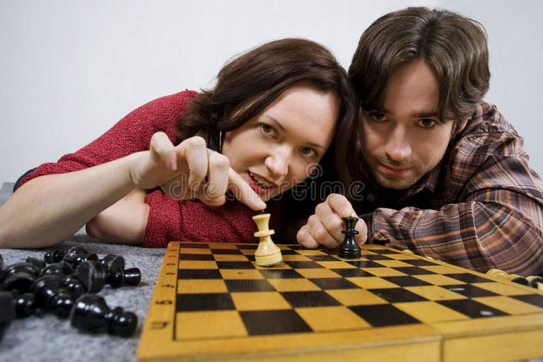 Couple playing chess game stock image. Image of intelligence - 11778303