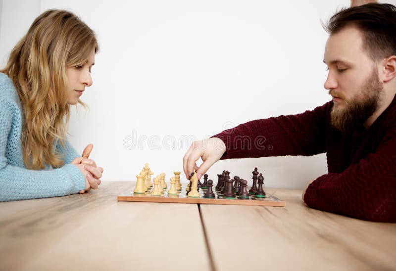 Couple playing chess. stock photo. Image of love, cute - 92438622