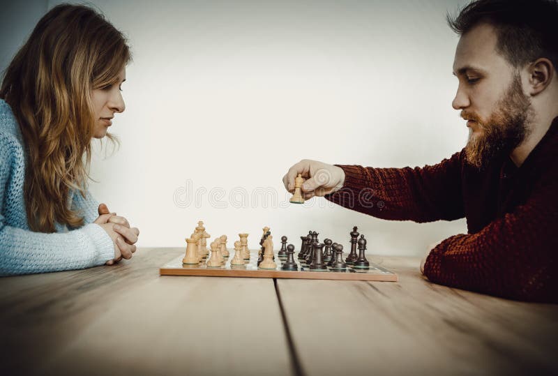 Couple playing chess. stock photo. Image of competition - 97255002