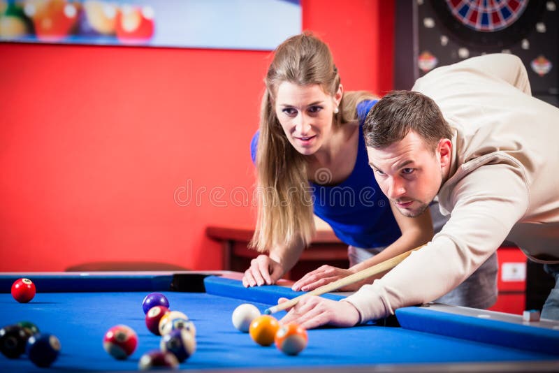 Couple playing pool stock image. Image of couple, people - 128935865