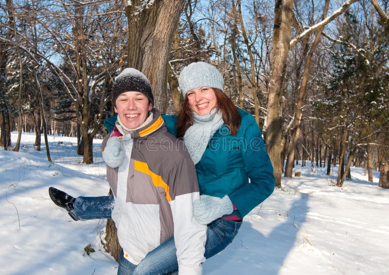 Couple playing in snow stock photo. Image of love, couple - 12941844