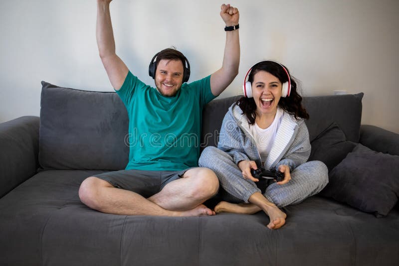 Couple Playing Video Games Together Stock Photo - Image of males ...