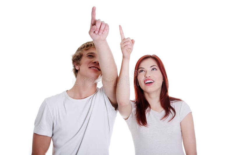 Happy Couple Looking and Pointing into the Distance Stock Photo - Image ...