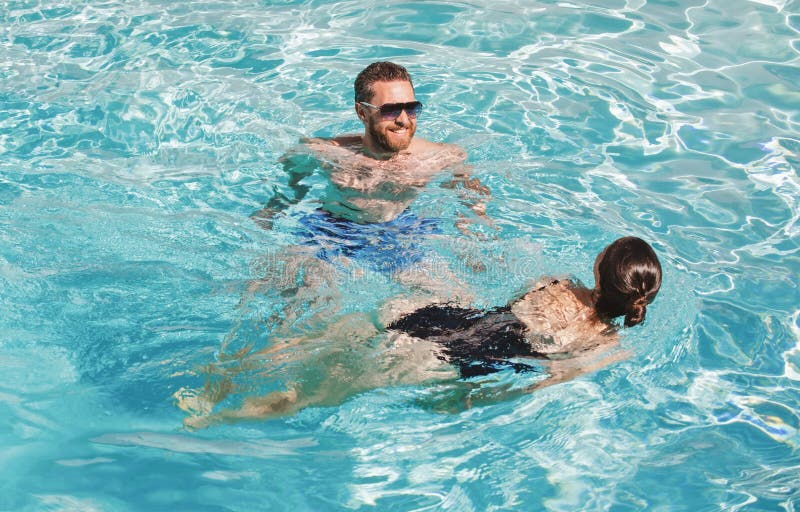 Couple at Pool Resort. Summertime Vacation. Summer Couple in Pool ...