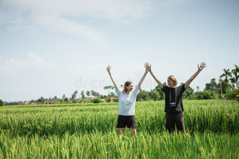 Couple Pose in the Middle of the Rice Field Stock Photo - Image of ...