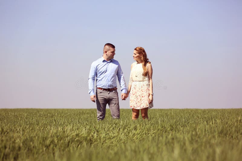 Couple Posing in the Fields Stock Photo - Image of male, field: 57604748