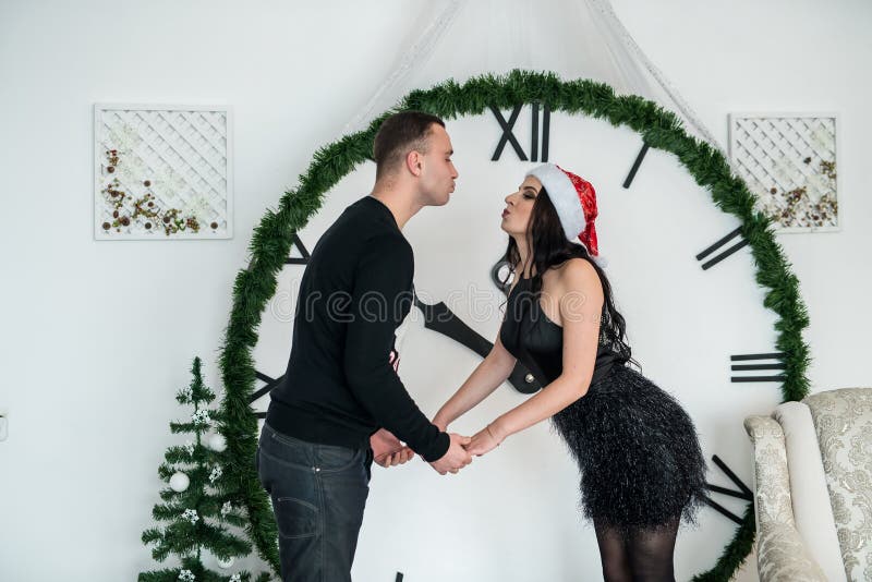 Couple Posing Near Clock Showing Midnight at Studio Stock Image - Image ...