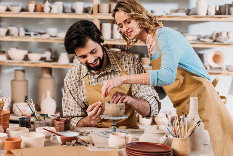 Couple of Potters Making Ceramic Dishware Together Stock Photo - Image ...