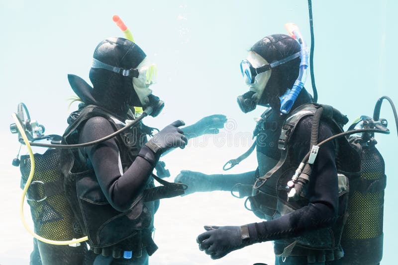 Couple Practicing Scuba Diving Together Stock Photo - Image of adult ...