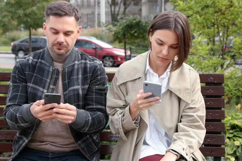 Couple Preferring Smartphones Over Spending Time with Each Other ...