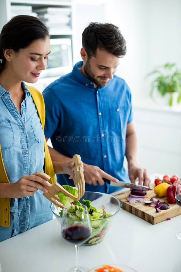 Couple Preparing Food Together in the Kitchen Stock Image - Image of ...