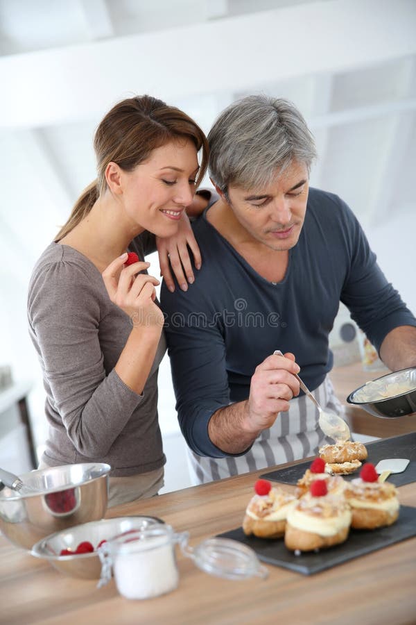 Couple Preparing Pastries in the Kitchen Stock Image - Image of fruits ...