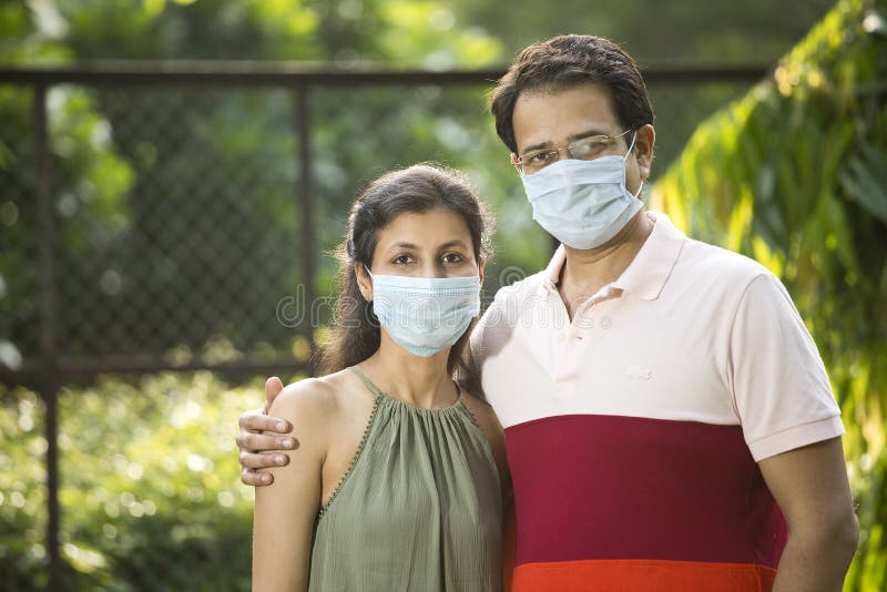 Couple with Protective Face Mask at Park Stock Image - Image of ...