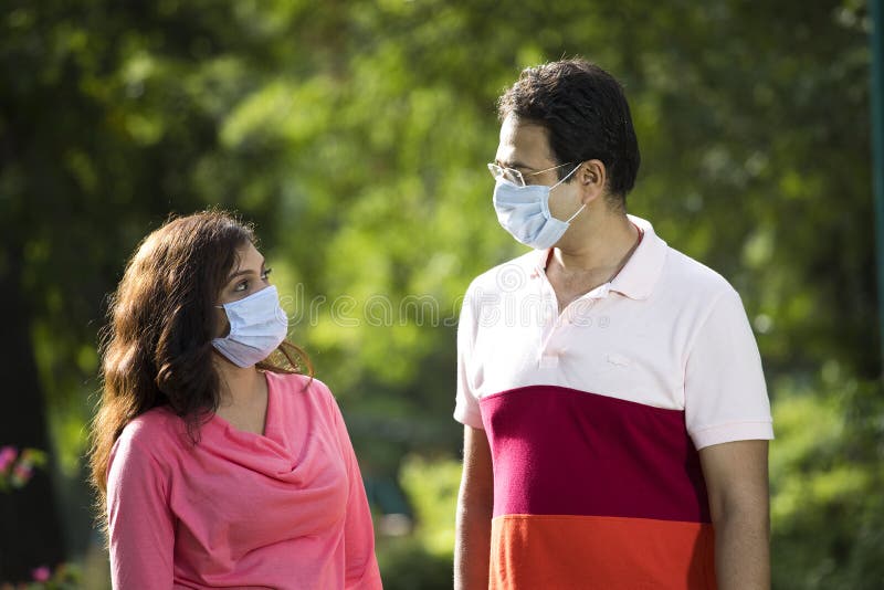 Couple with Protective Face Mask at Park Stock Image - Image of covid19 ...