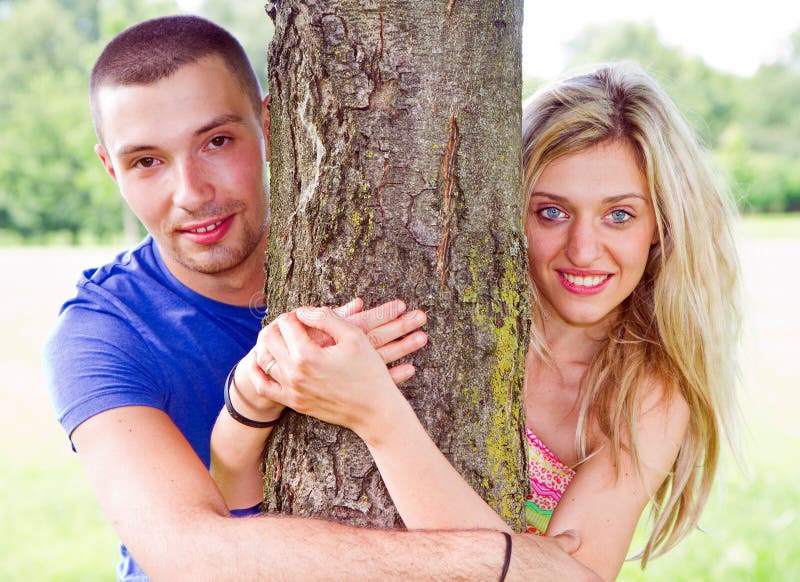 Couple is Putting Their Hands on Tree in a Shape of Heart Stock Image ...