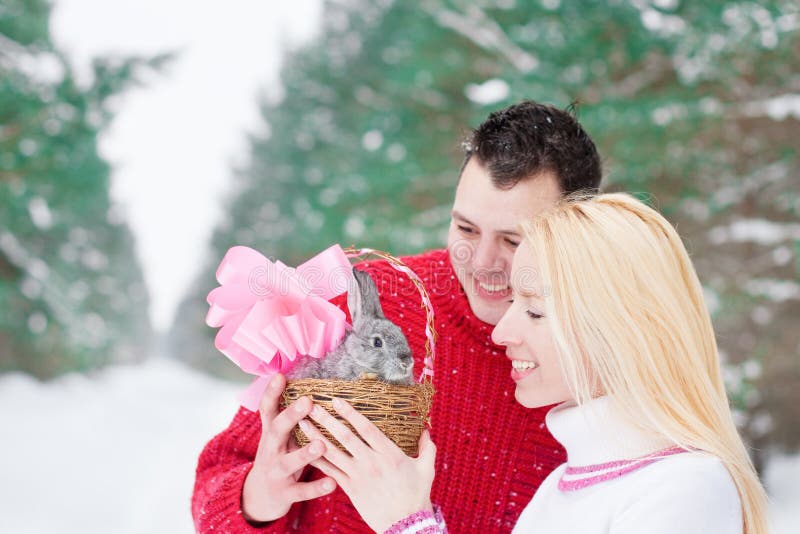 Couple with rabbit outdoor stock image. Image of lifestyle - 16570951
