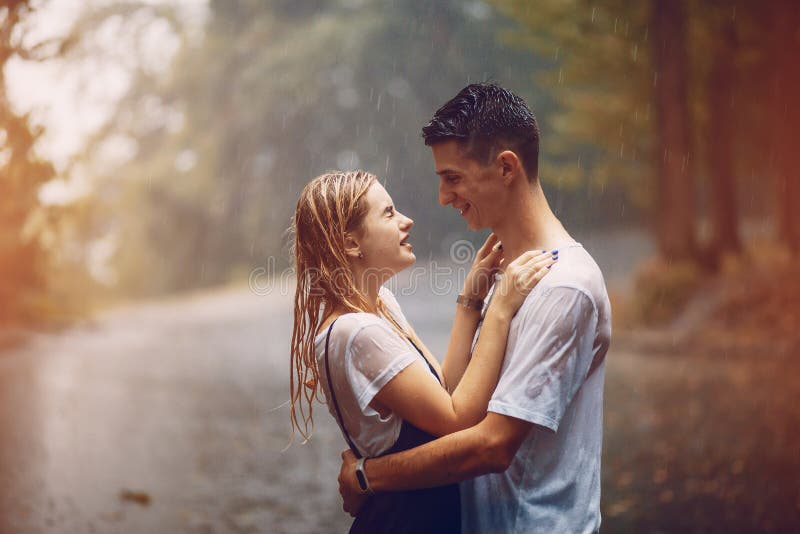 Couple in the rain stock photo. Image of love, sensuality - 118761256