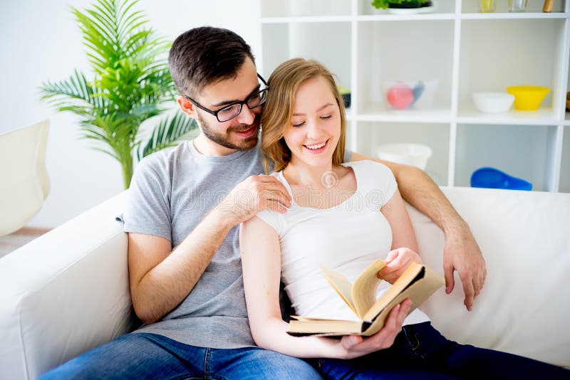 Couple reading a book stock image. Image of book, caucasian - 92816817