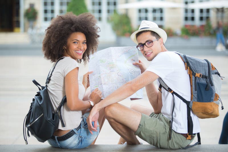 Couple reading map stock image. Image of capture, travel - 205858175