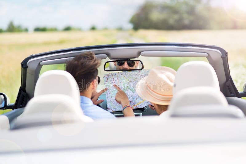 Couple Reading a Map while Sitting in the Car Stock Photo - Image of ...